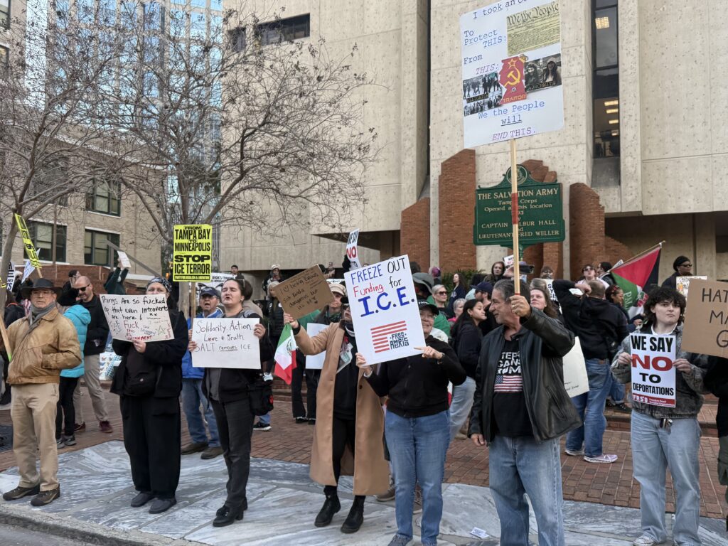 Tampa demonstrators protest Trump administration, one year after ...