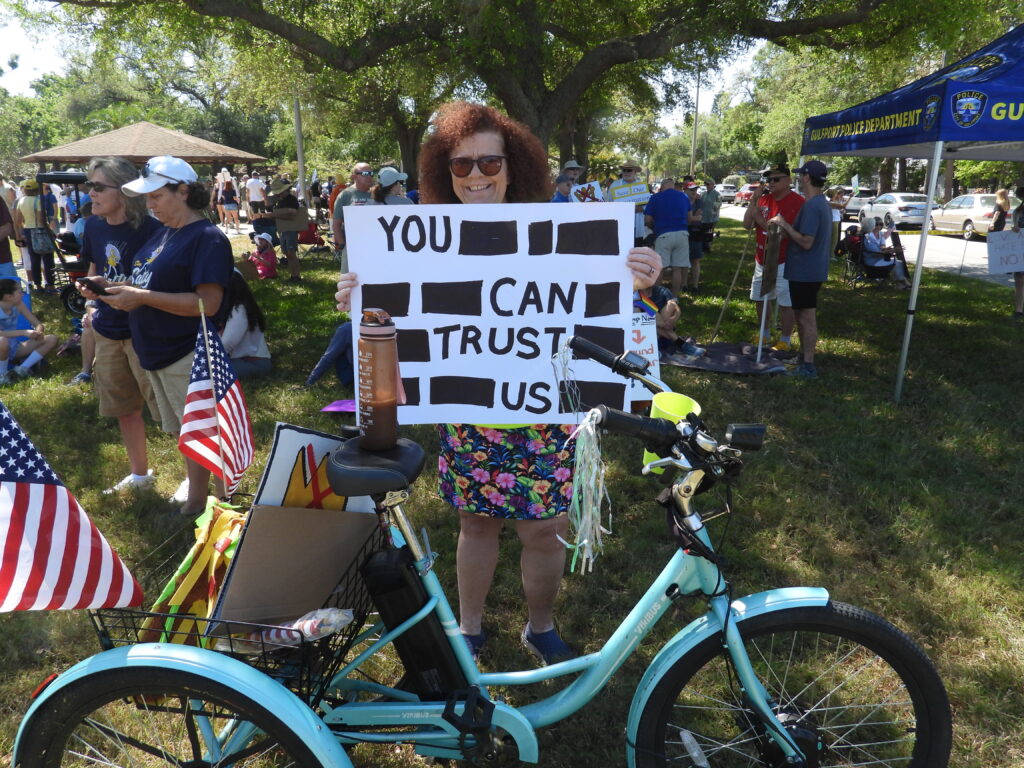 2,000 No Kings demonstrators chant and wave signs in Gulfport - WMNF 88 ...